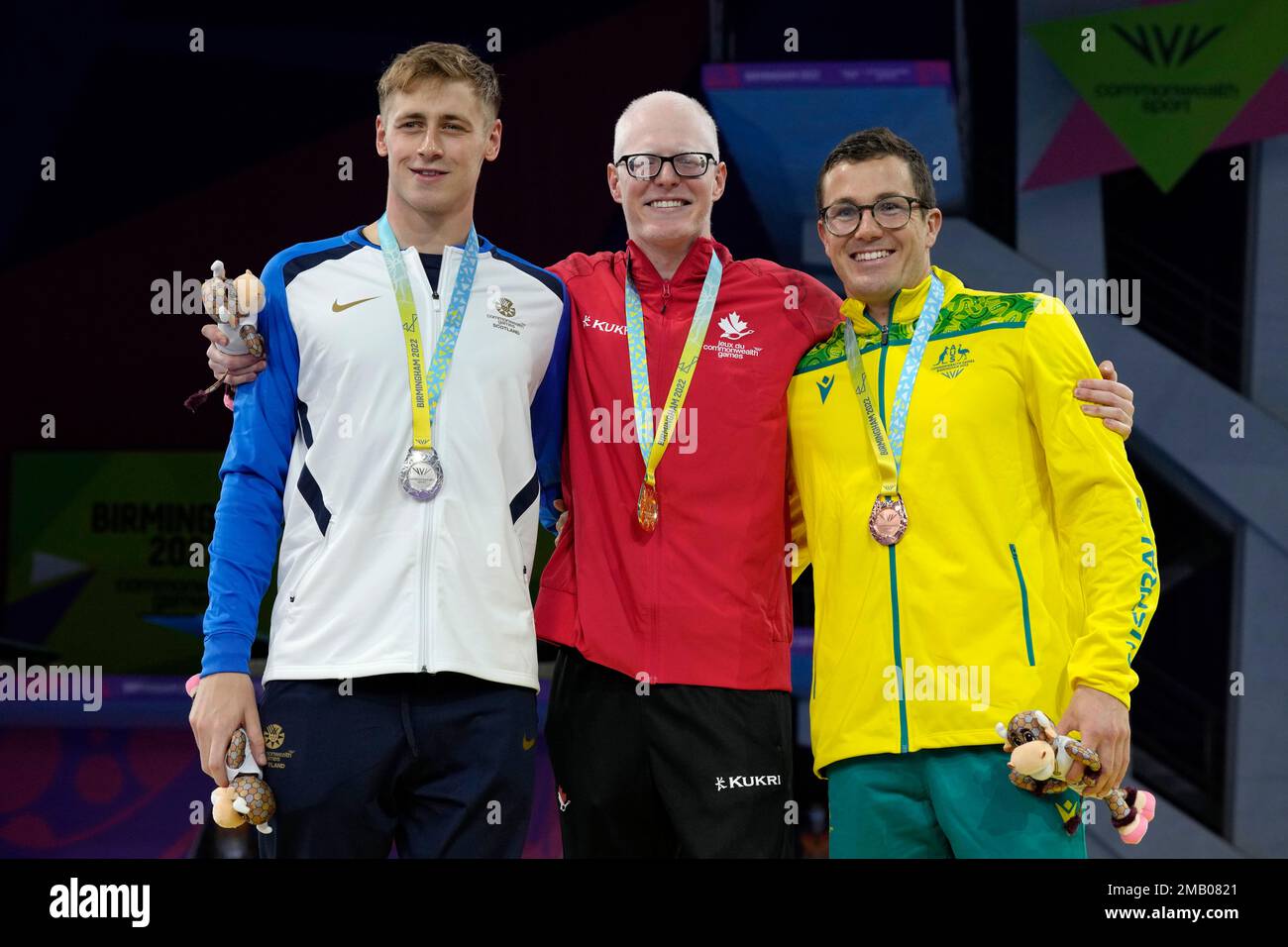 Silver medalist Stephen Clegg of Scotland, Nicolas Guy Turbide of ...