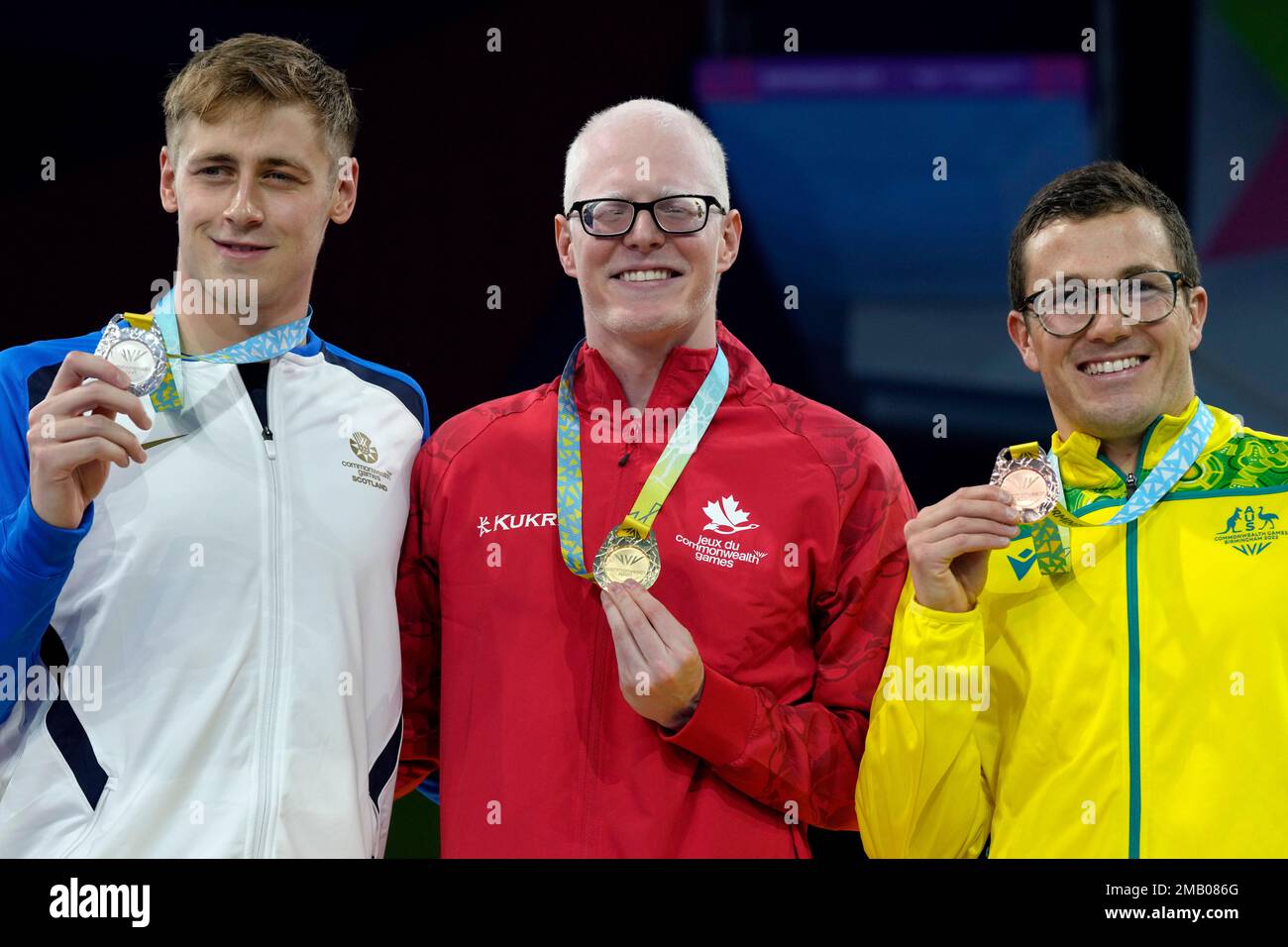 Silver medalist Stephen Clegg of Scotland, Nicolas Guy Turbide of ...
