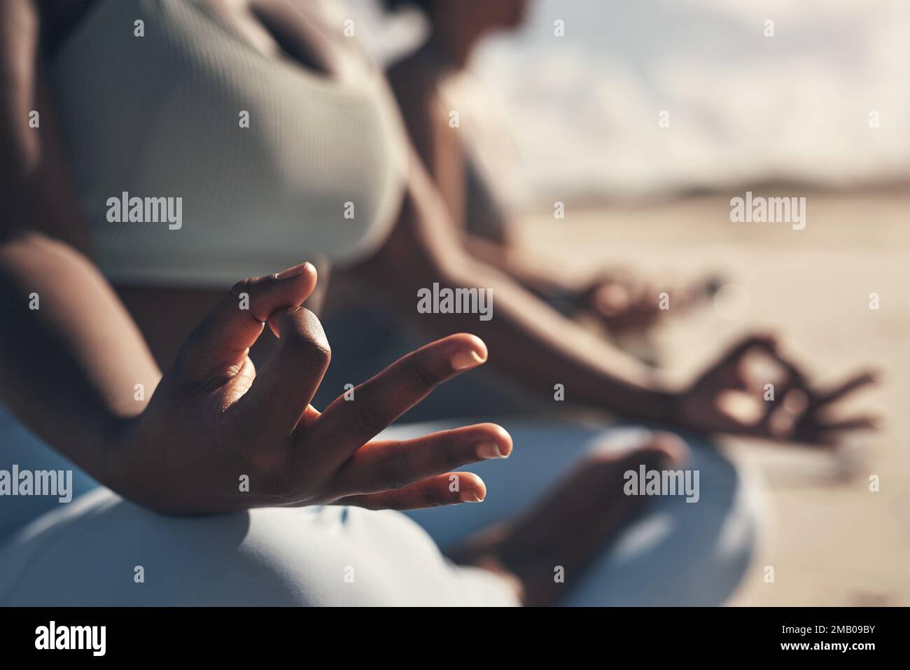 Change begins within. a woman meditating during her yoga routine on the ...