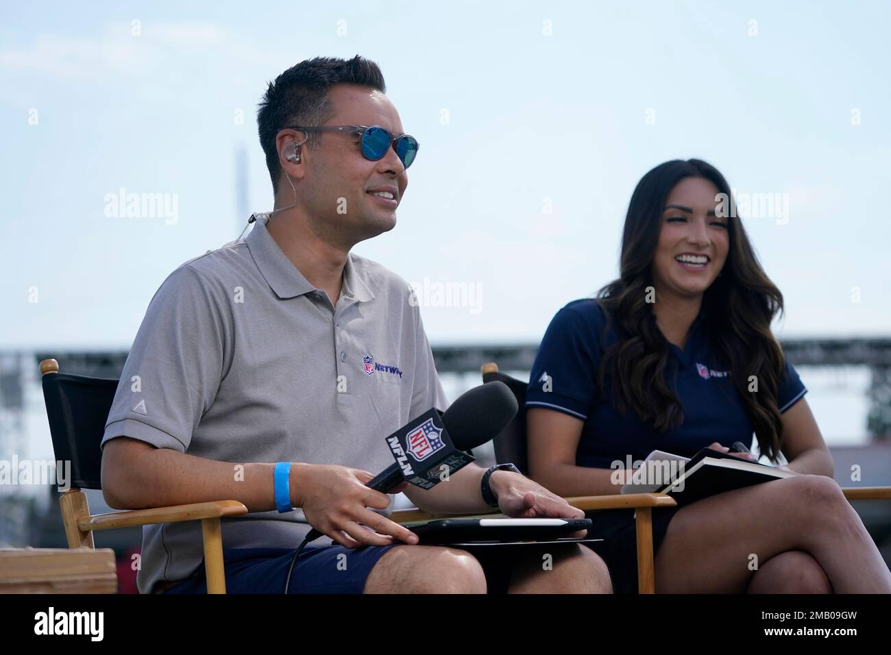 NFL Network reporter Mike Yam, left, and San Francisco 49ers team ...