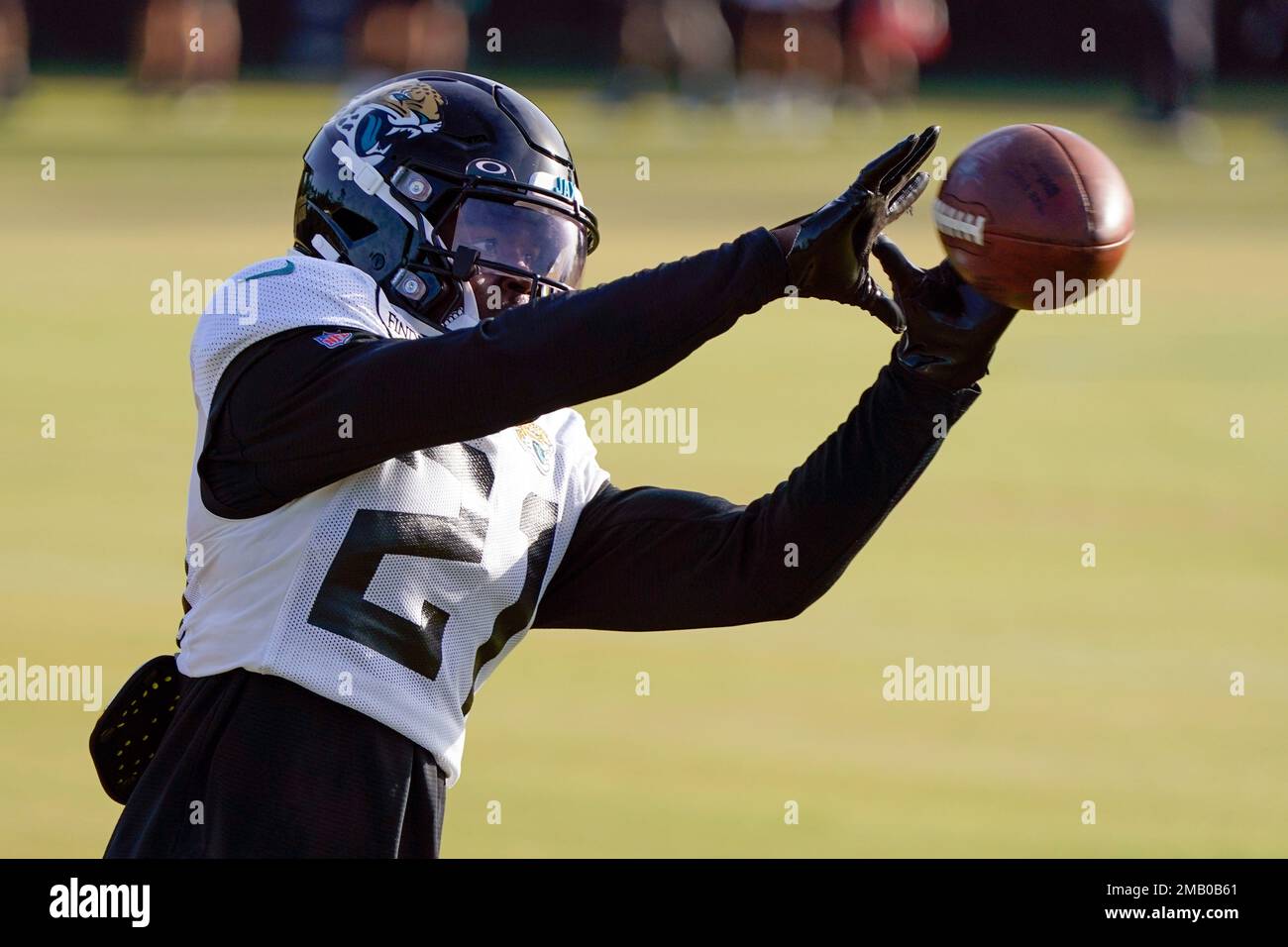 Jacksonville Jaguars defensive back Darious Williams (21) works on a defensive drill during an ...