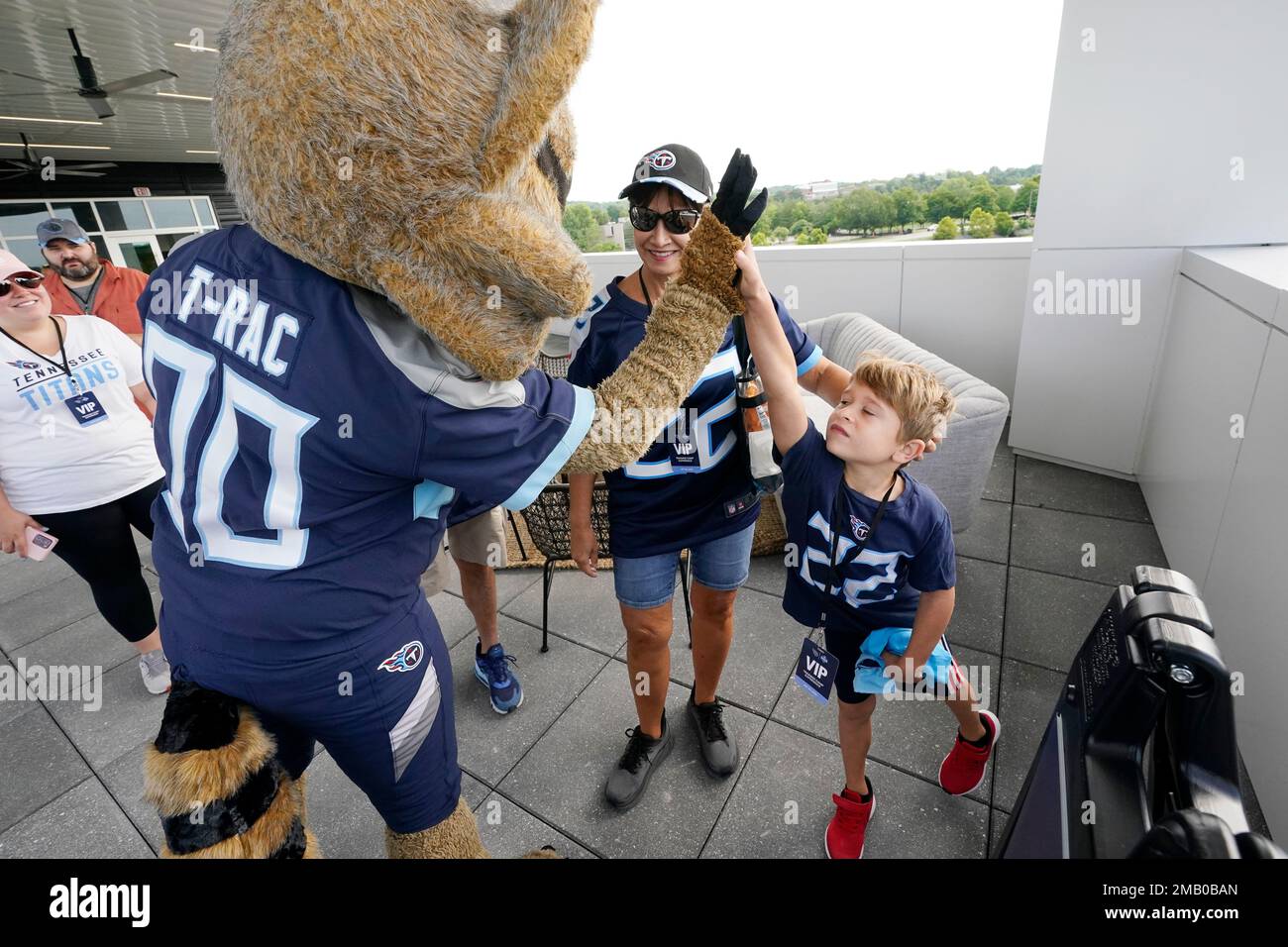 T-Rac, the Tennessee Titans mascot, greets fans at training camp at the ...