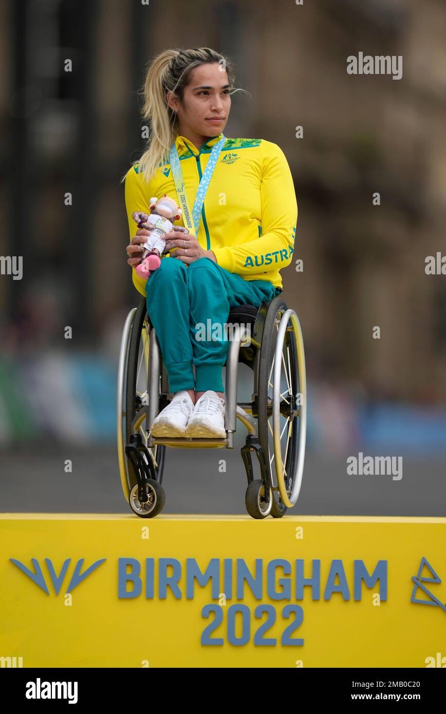 Australia's Madison de Rozario on the podium after winning gold in the ...