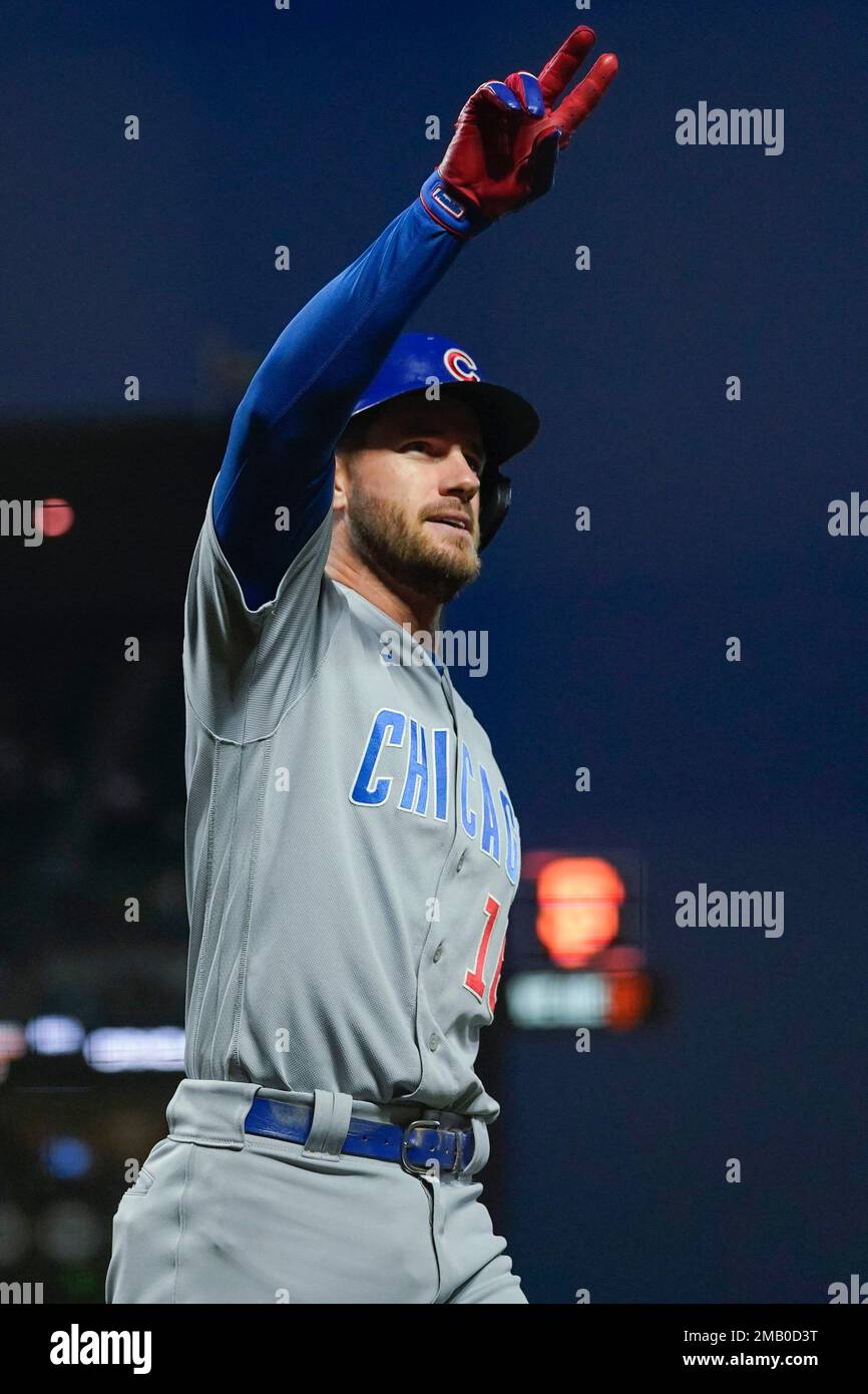 Chicago Cubs' Patrick Wisdom gestures after hitting a solo home run ...