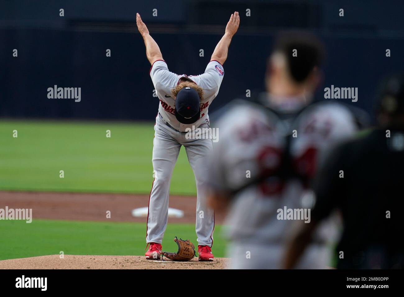 Minnesota Twins starting pitcher Joe Ryan stretches before facing his ...