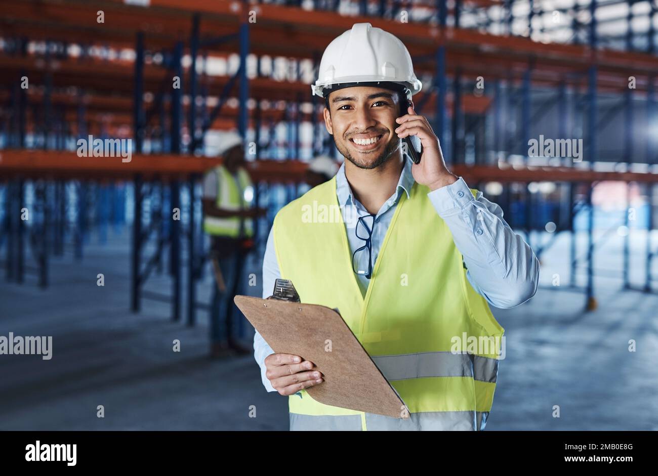 Were here and waiting. a handsome young contractor standing alone in ...