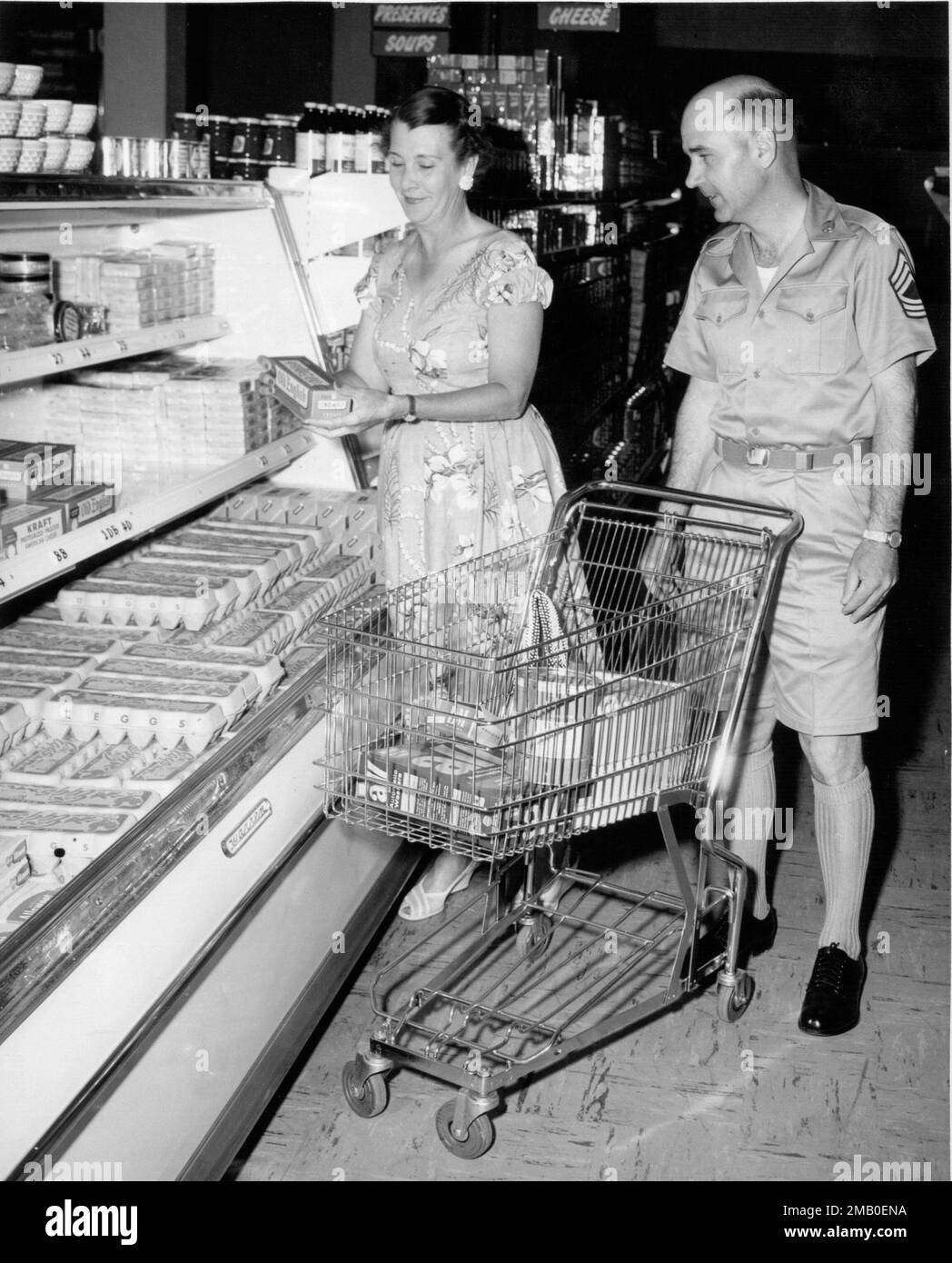 An Army couple shops in the Fort Riley, Kansas, Commissary in 1957 ...
