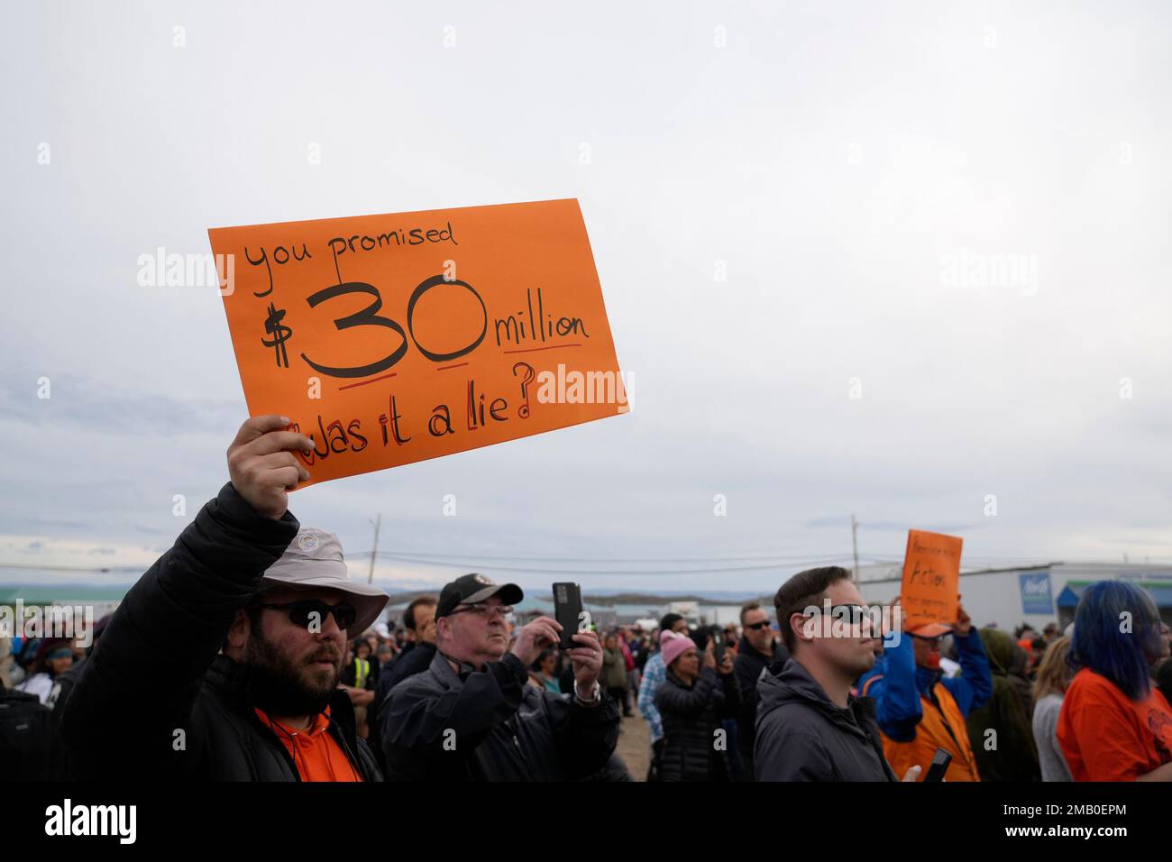 People protest during a meeting with Pope Francis at Nakasuk Elementary ...