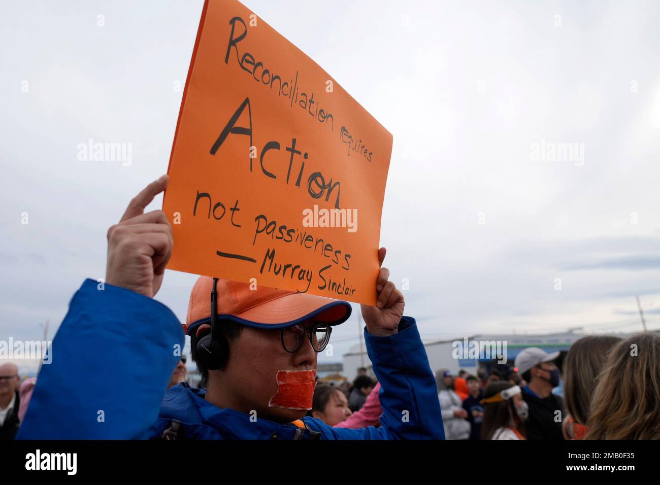 A man protests during a meeting with Pope Francis at Nakasuk Elementary ...