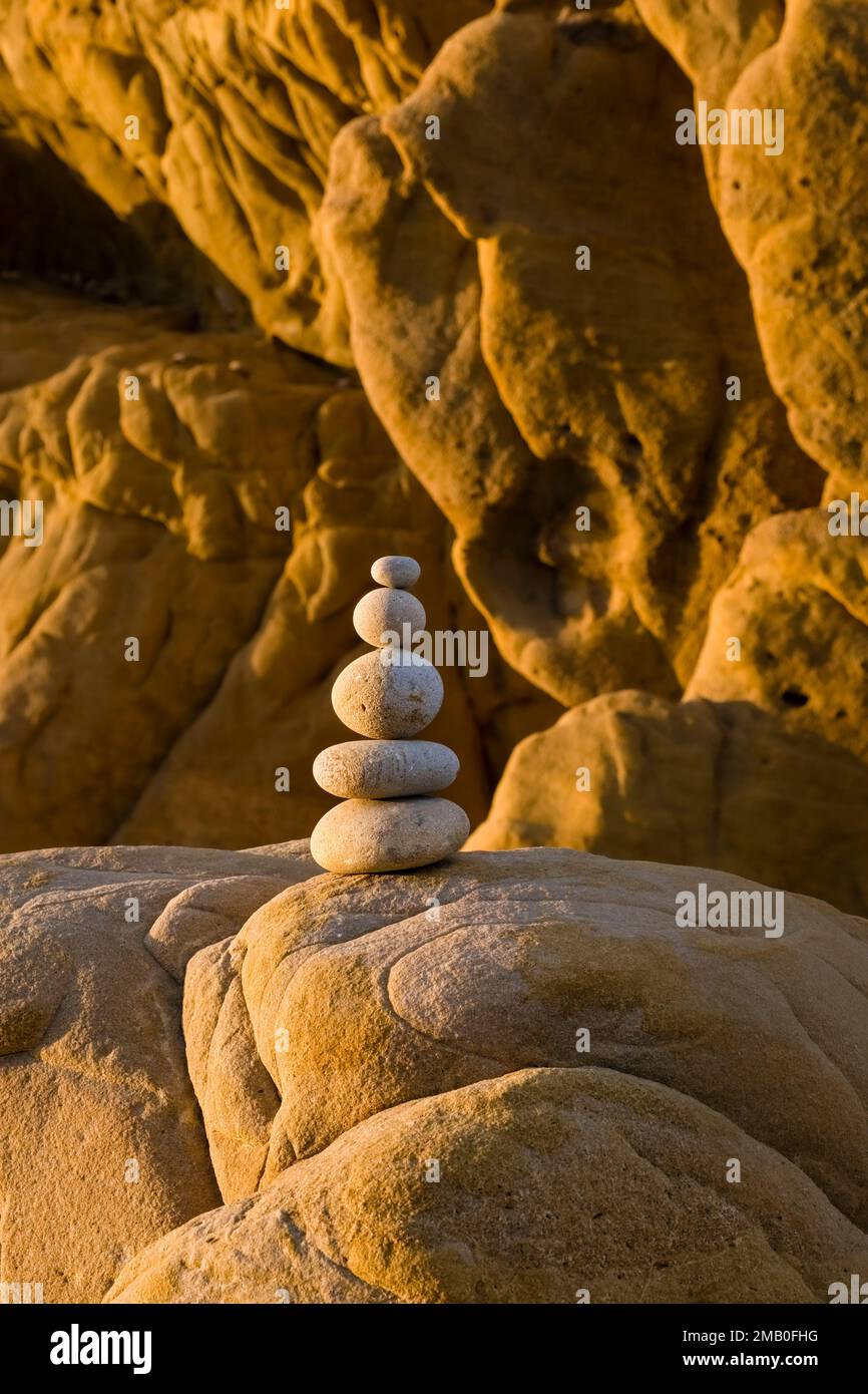 A well-balanced cairn on the beach of the small town of Castle di Tusa ...