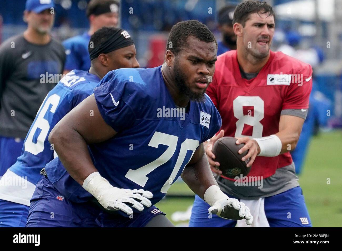 New York Giants offensive lineman Evan Neal (70) participates during ...