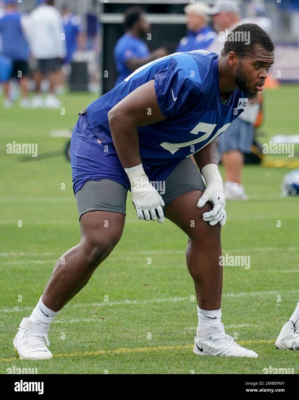 New York Giants offensive lineman Evan Neal (70) participates during ...