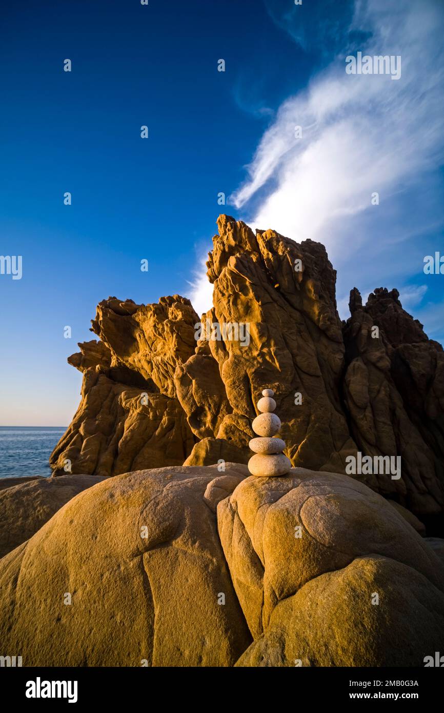 A well-balanced cairn on the beach of the small town of Castle di Tusa ...