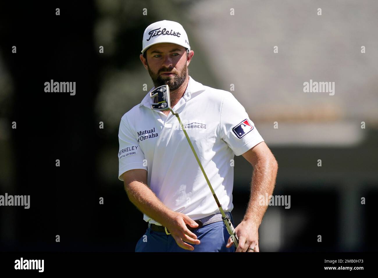 Chris Young watches his putt on the ninth green during the second round ...