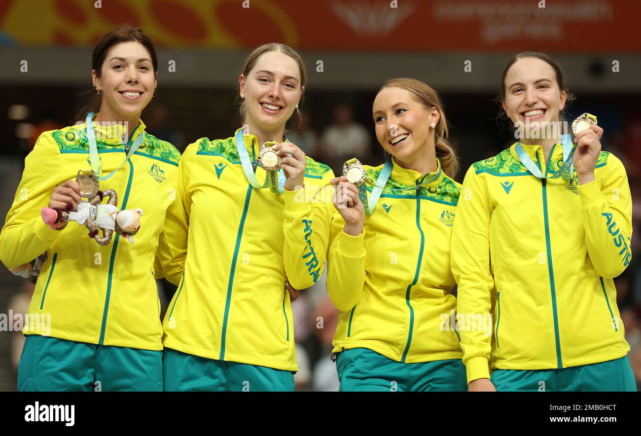 Australia's team celebrate with gold medals during a medal ceremony for ...