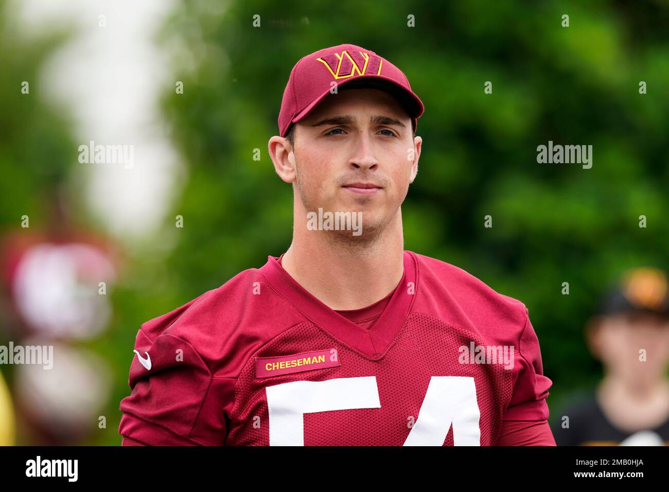 Washington Commanders long snapper Camaron Cheeseman (54) walks to ...