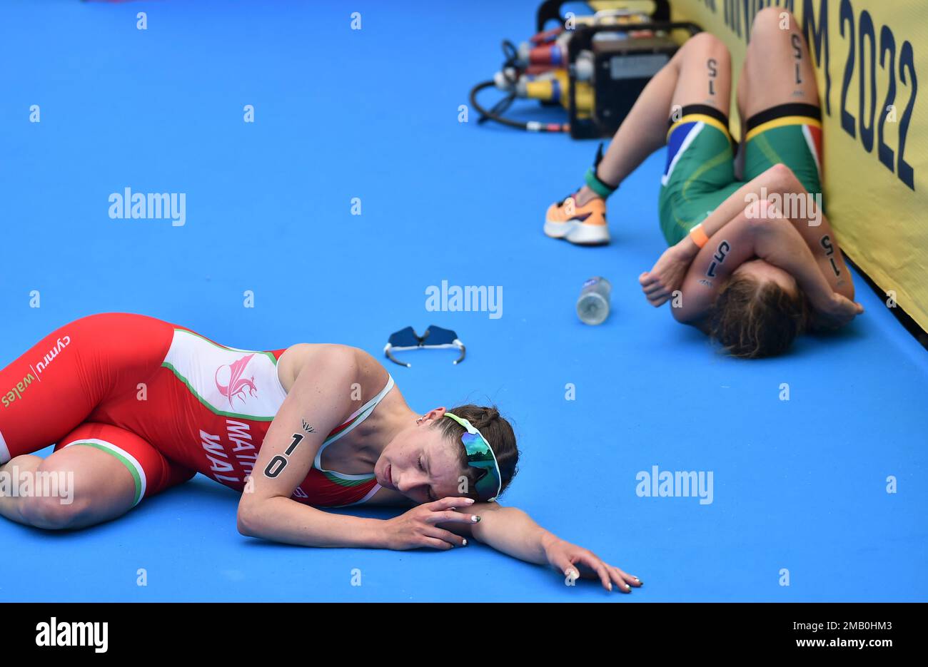 Olivia Mathias of Wales, left, and Simone Ackerman of South Africa rest ...