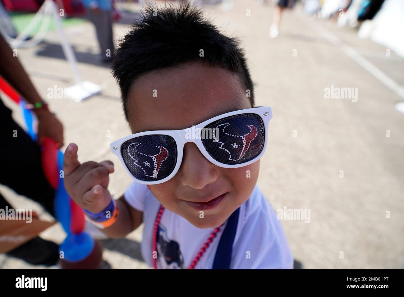 Alexander Aguilar wears Houston Texans sunglasses while attending the ...