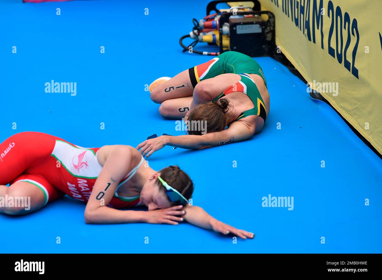 Olivia Mathias of Wales, left, and Simone Ackerman of South Africa rest ...