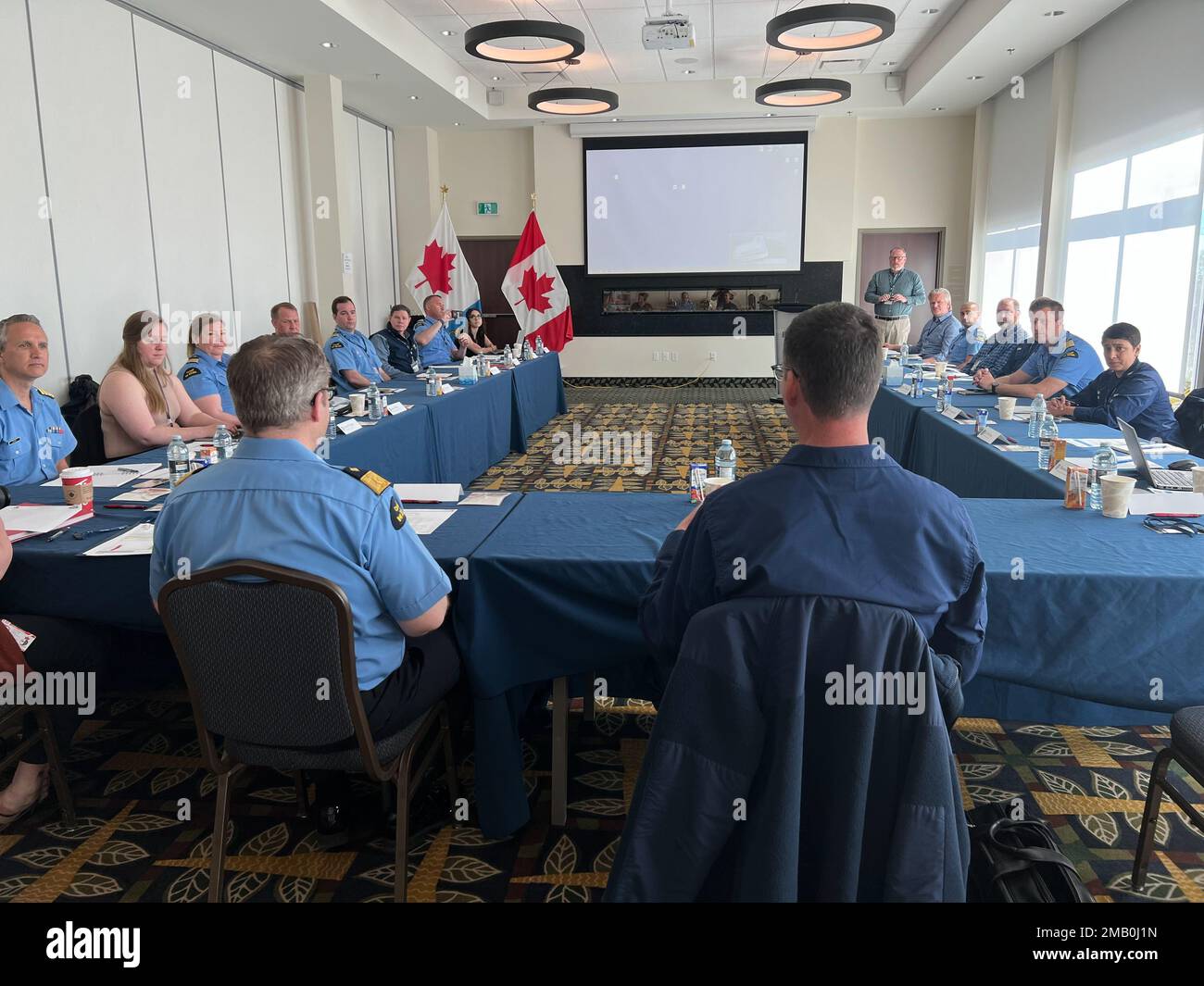 Canadian Coast Guard, U.S. Coast Guard, and civilian personnel ...