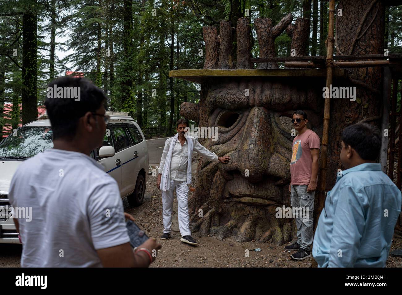 Visitors take a photo at the entrance of an entertainment park in ...