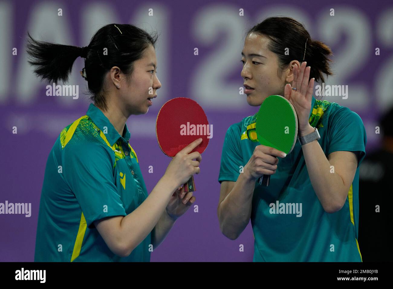 Australia's Minhyung Jee, right, and Yangzi Liu talk as they compete ...