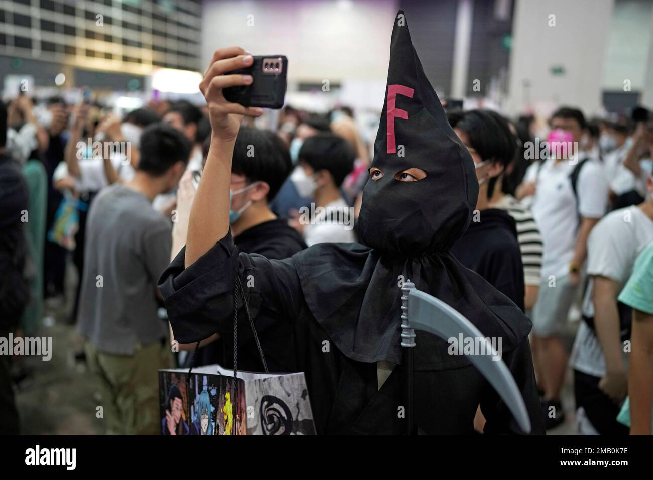 A participant wearing his cosplay featuring a character from an ...
