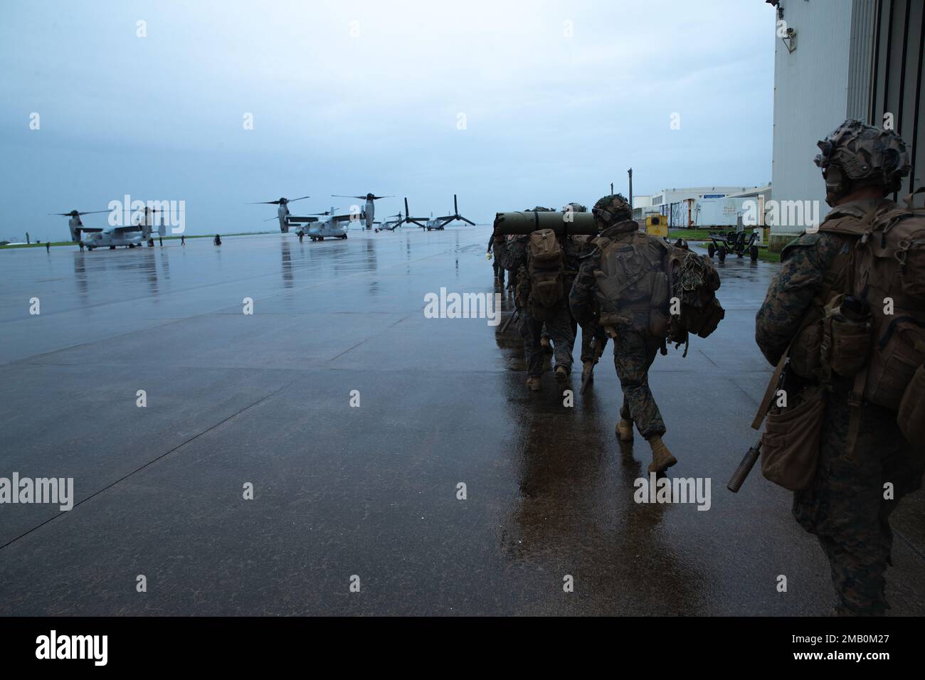 U.S. Marines with 3d Battalion, 2d Marines prepare to board an MV-22B ...