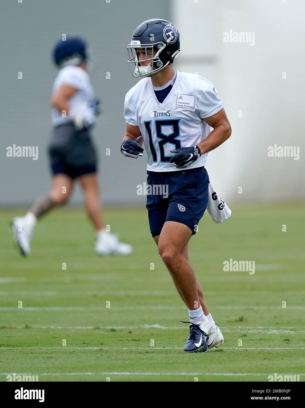 Tennessee Titans wide receiver Kyle Philips (18) takes part in drills ...
