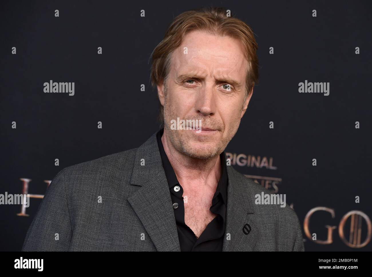 Rhys Ifans arrives at the premiere of "House of the Dragon" on ...