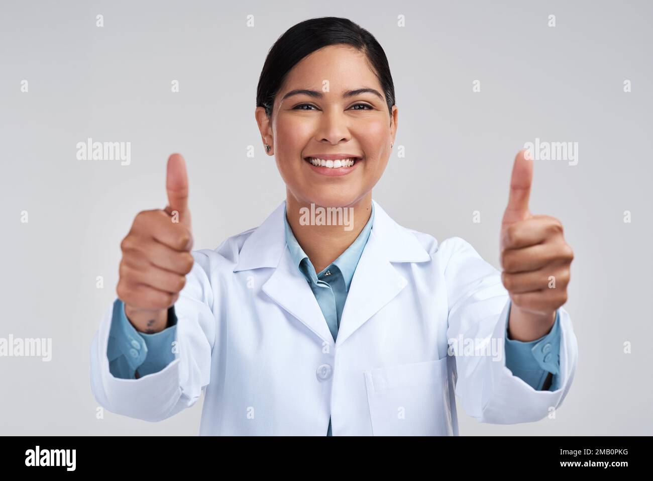 Two thumbs up for science. Cropped portrait of an attractive young ...