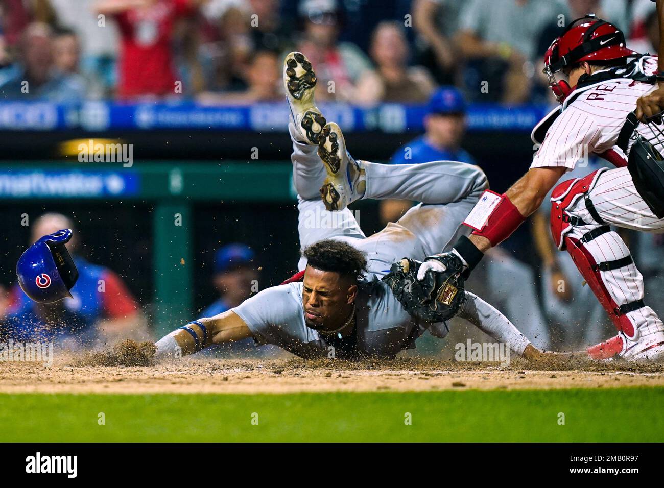 Chicago Cubs' Christopher Morel scores past Philadelphia Phillies' J.T ...