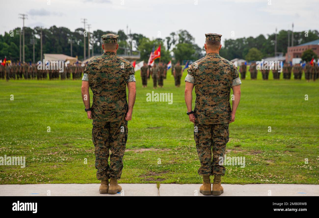 U.S. Marine Corps Lt. Col. Scott H. Helminski, left, the incoming ...