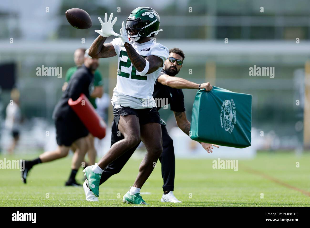 New York Jets running back La'Michael Perine takes part in drills at ...