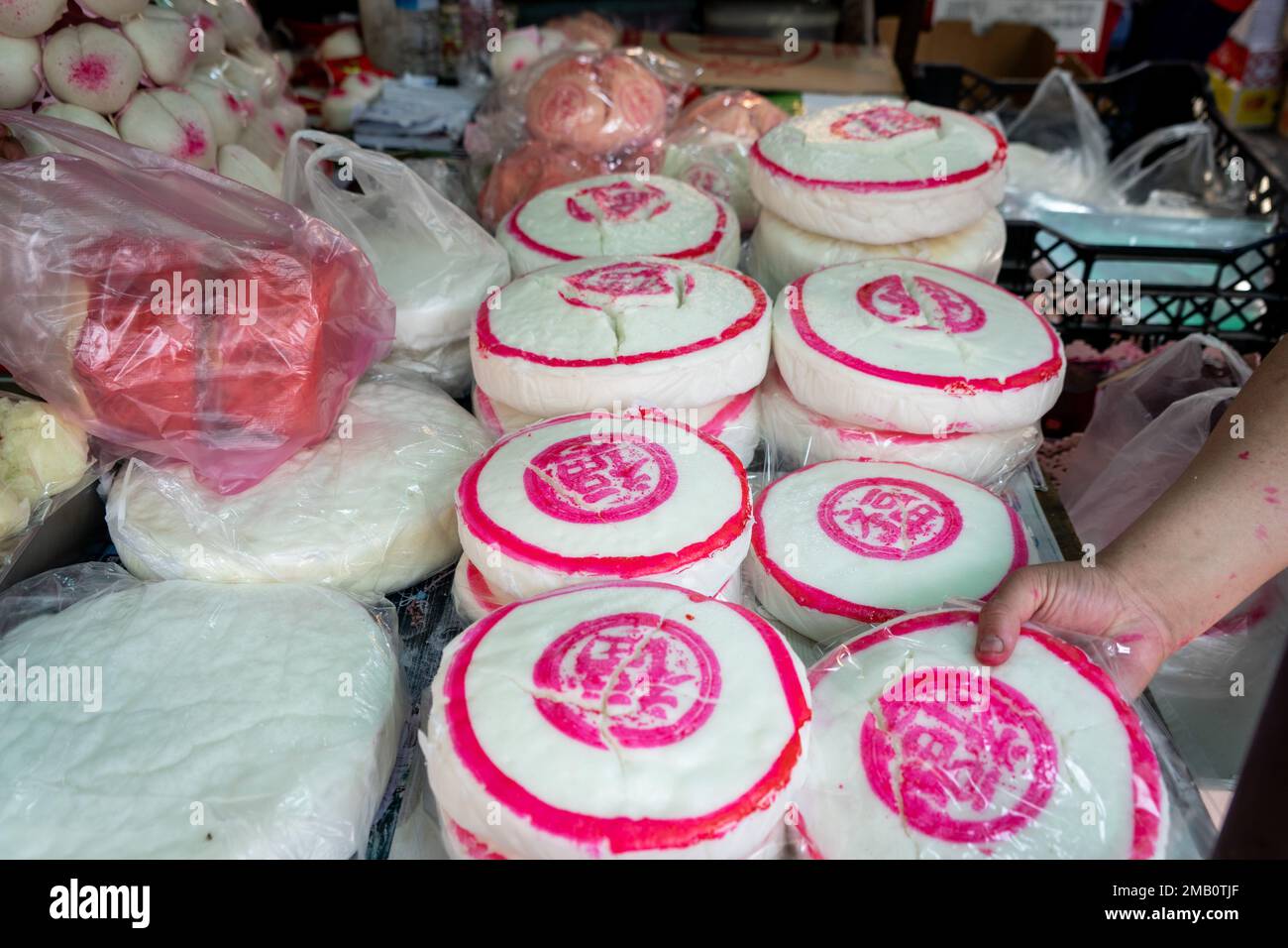Traditional Chinese cakes are seen for sale at a pushcart vendor in ...
