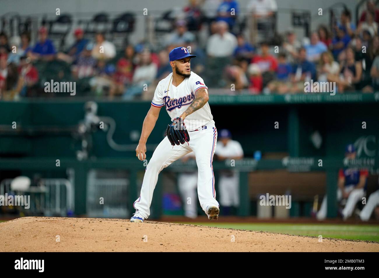 Texas Rangers relief pitcher Jonathan Hernandez throws to the Seattle ...