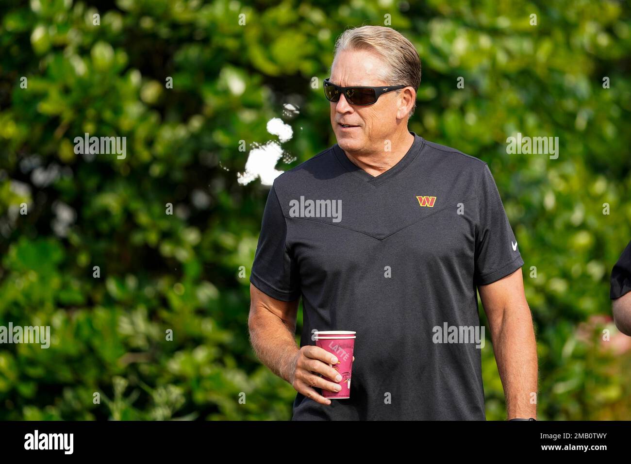Washington Commanders defensive coordinator Jack Del Rio walks to ...