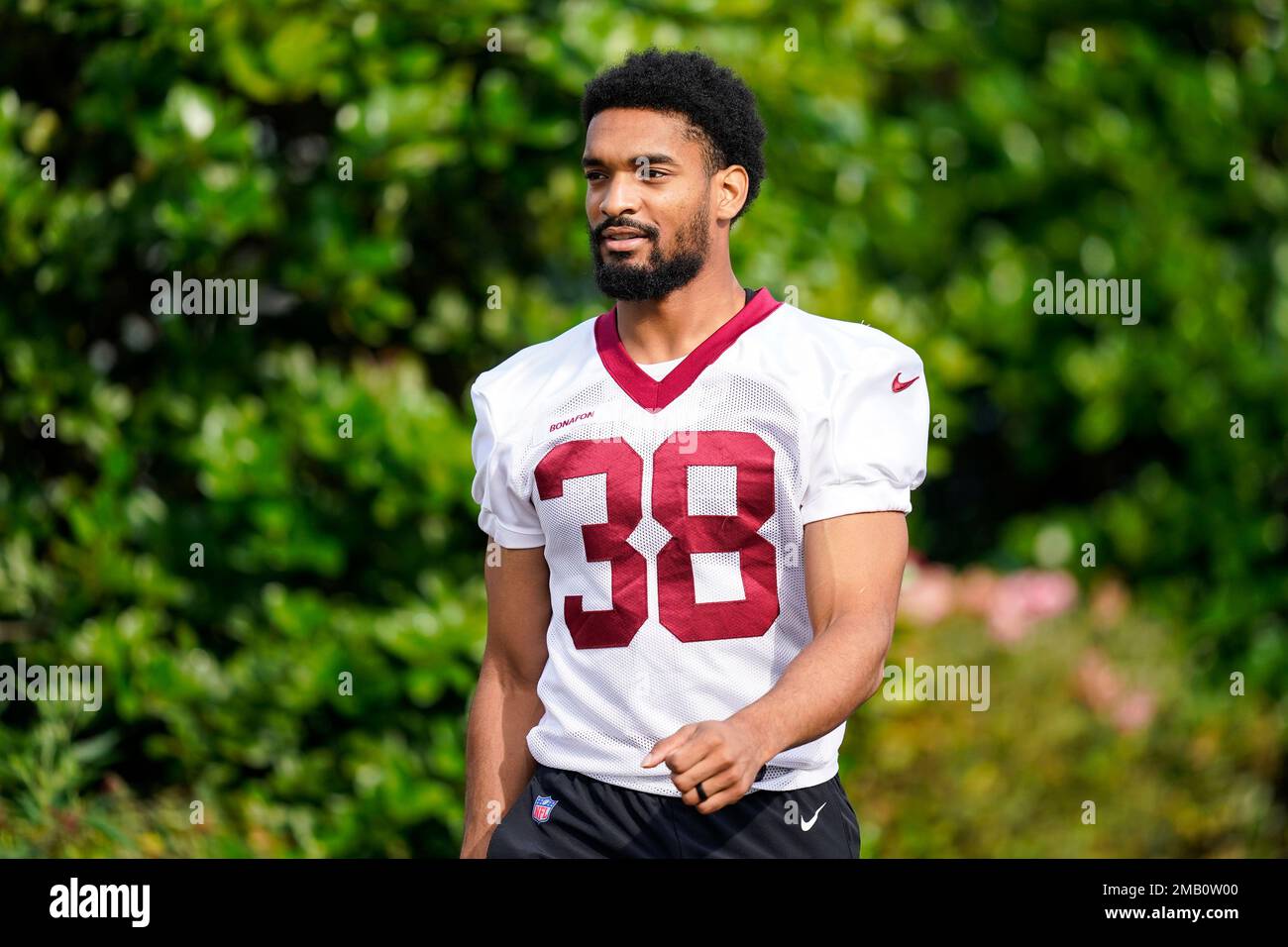 Washington Commanders running back Reggie Bonnafon (38) walks to ...