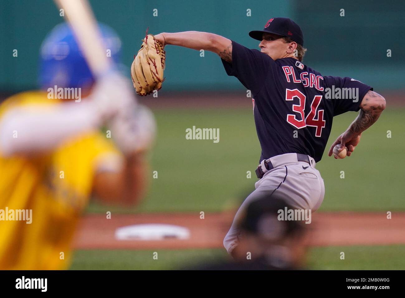 Cleveland Guardians starting pitcher Zach Plesac delivers during a ...