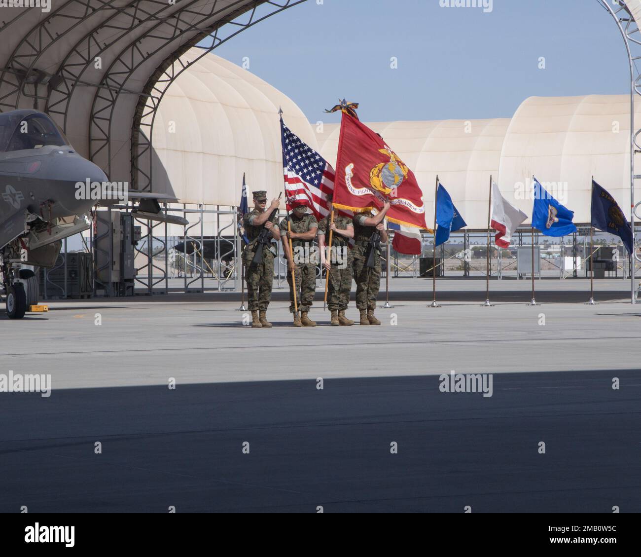 U.S. Marines with the Marine Fighter Attack Squadron 211 (VMFA-211) color guard participate in a ...