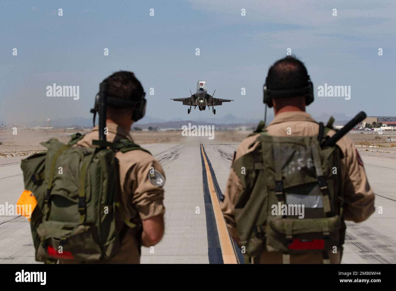 U.S. Marine Corps Capt. Matthew Hester, left, the assistant operations ...
