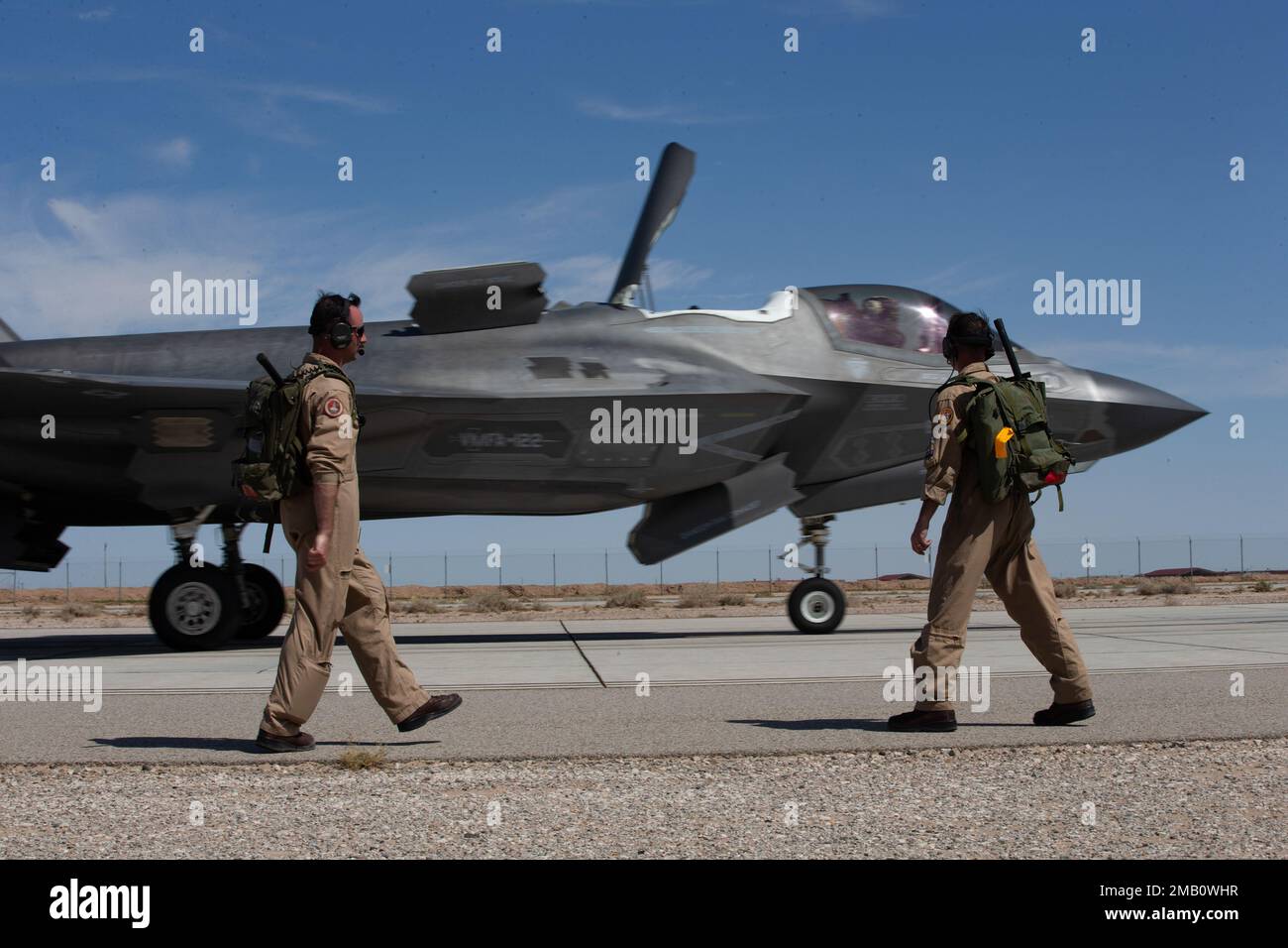 U.S. Marine Corps Capt. Matthew Hester, left, the assistant operations ...