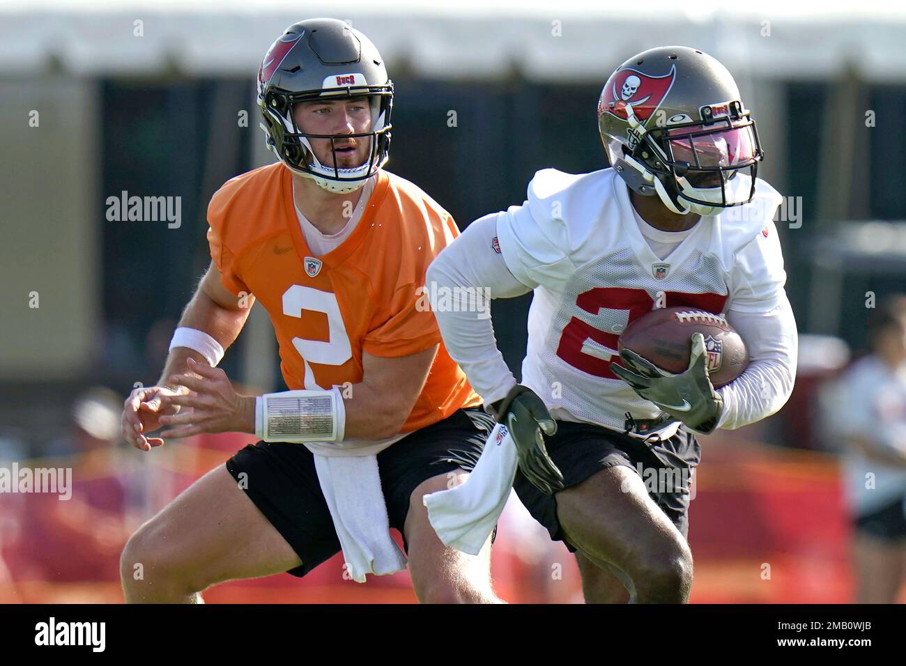 Tampa Bay Buccaneers quarterback Kyle Trask (2) hands off to running ...
