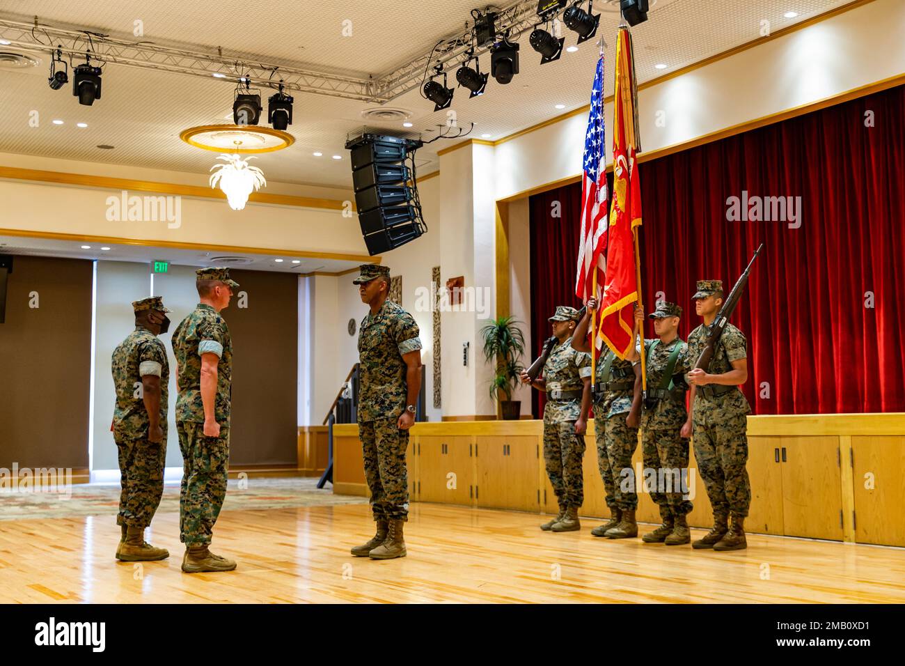 U.S. Marine Corps Lt. Col. Roe Lemons prepares to be awarded during a ...