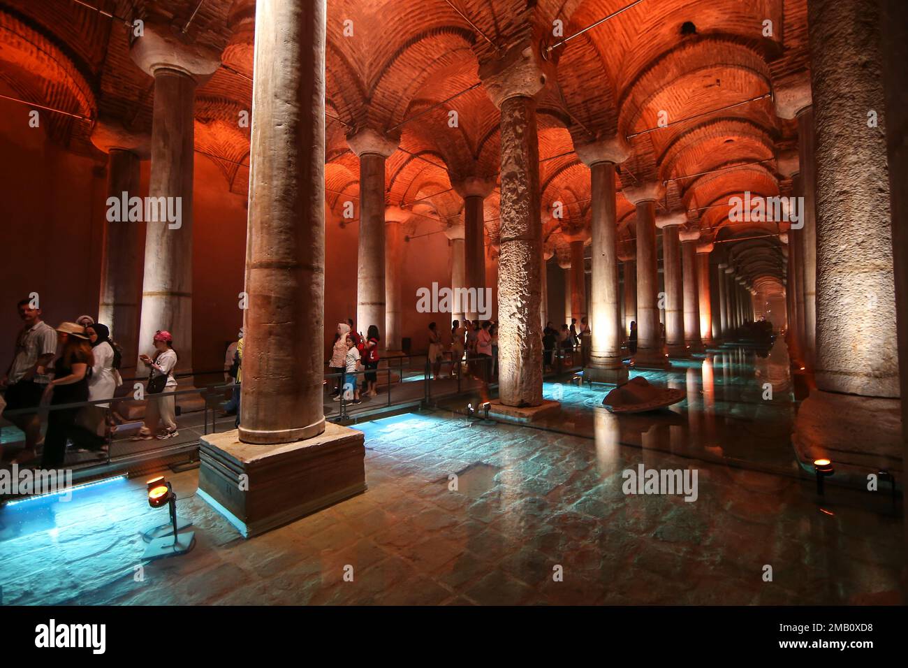Visitors walk along the Byzantine-era Basilica Cistern in Istanbul ...