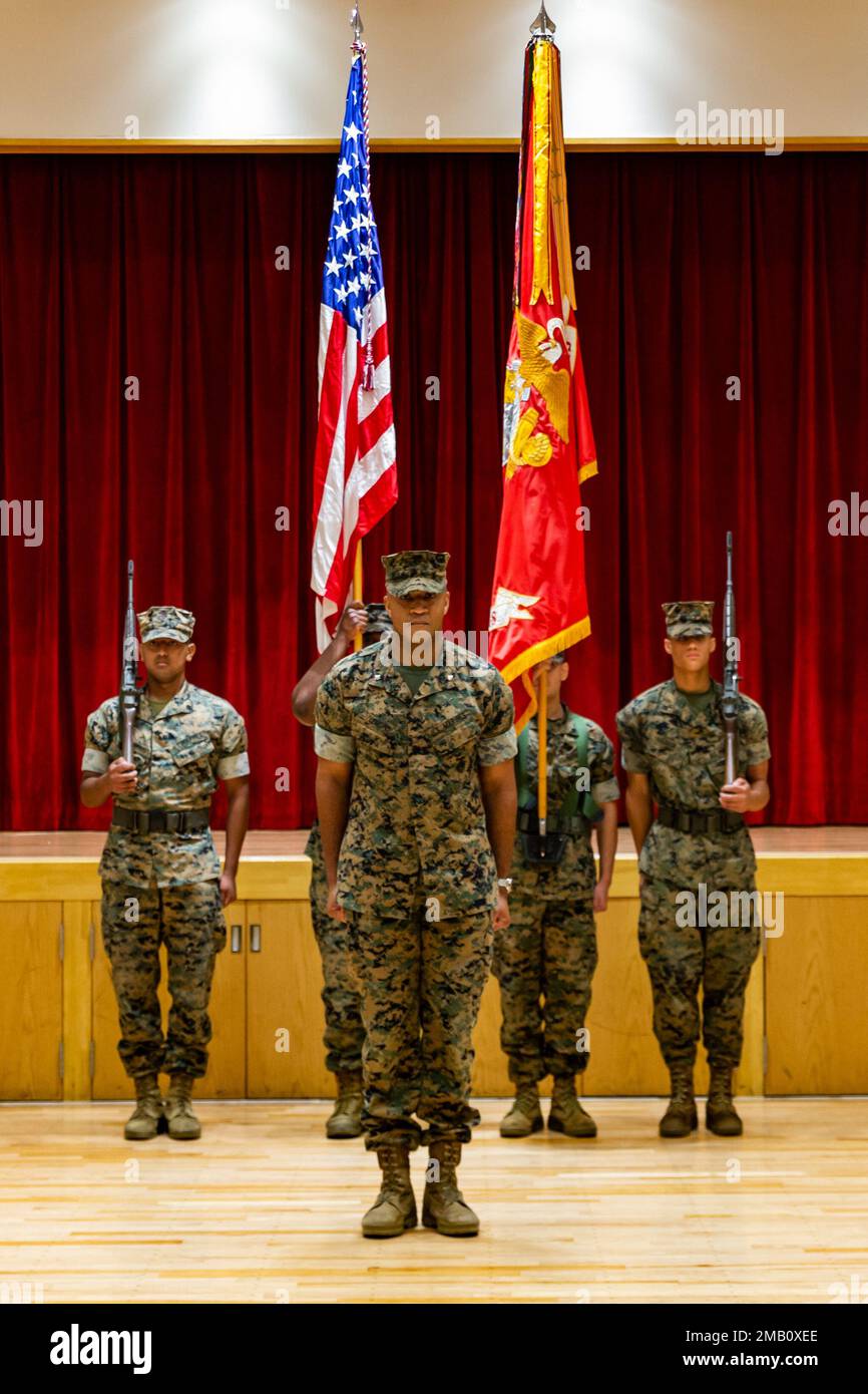 U.S. Marine Corps Lt. Col. Roe Lemons prepares to be awarded during a ...