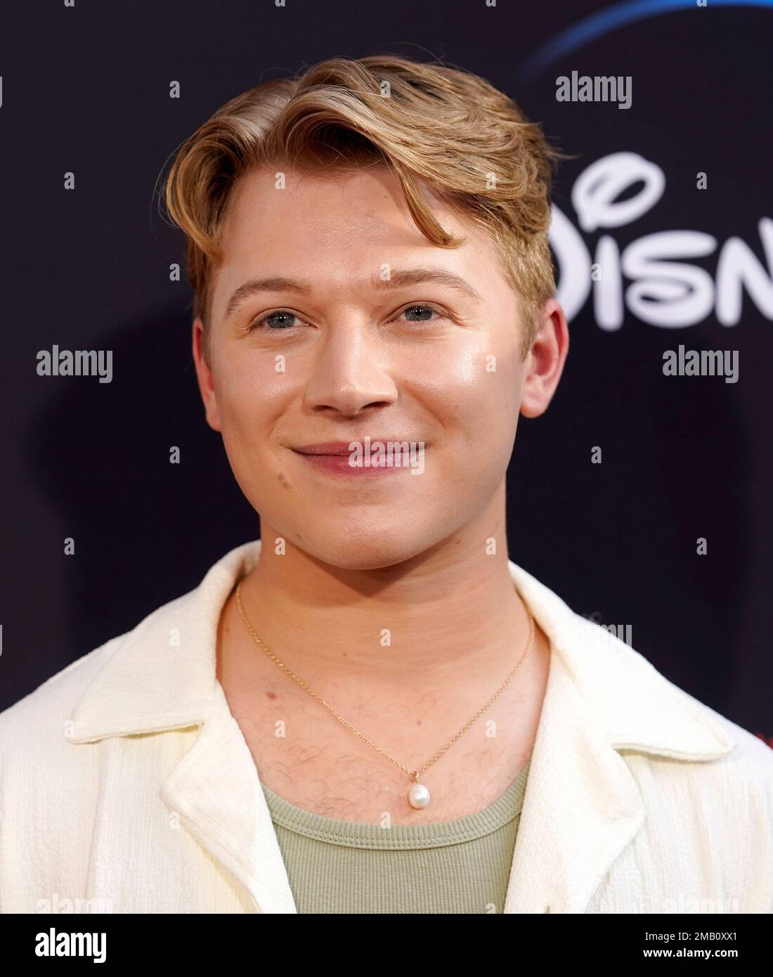 Joe Serafini poses at the season three premiere of the Disney ...