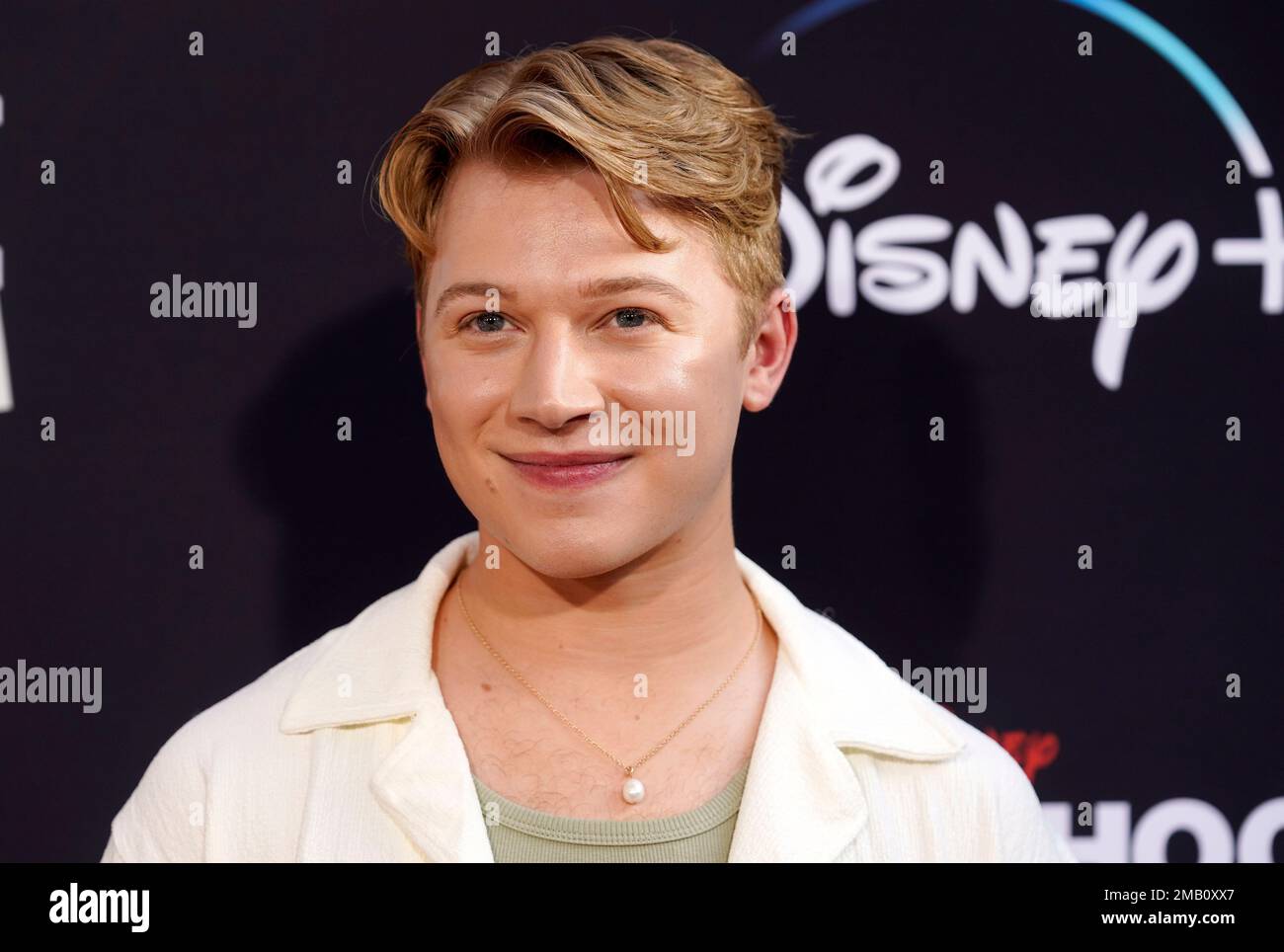 Joe Serafini poses at the season three premiere of the Disney ...