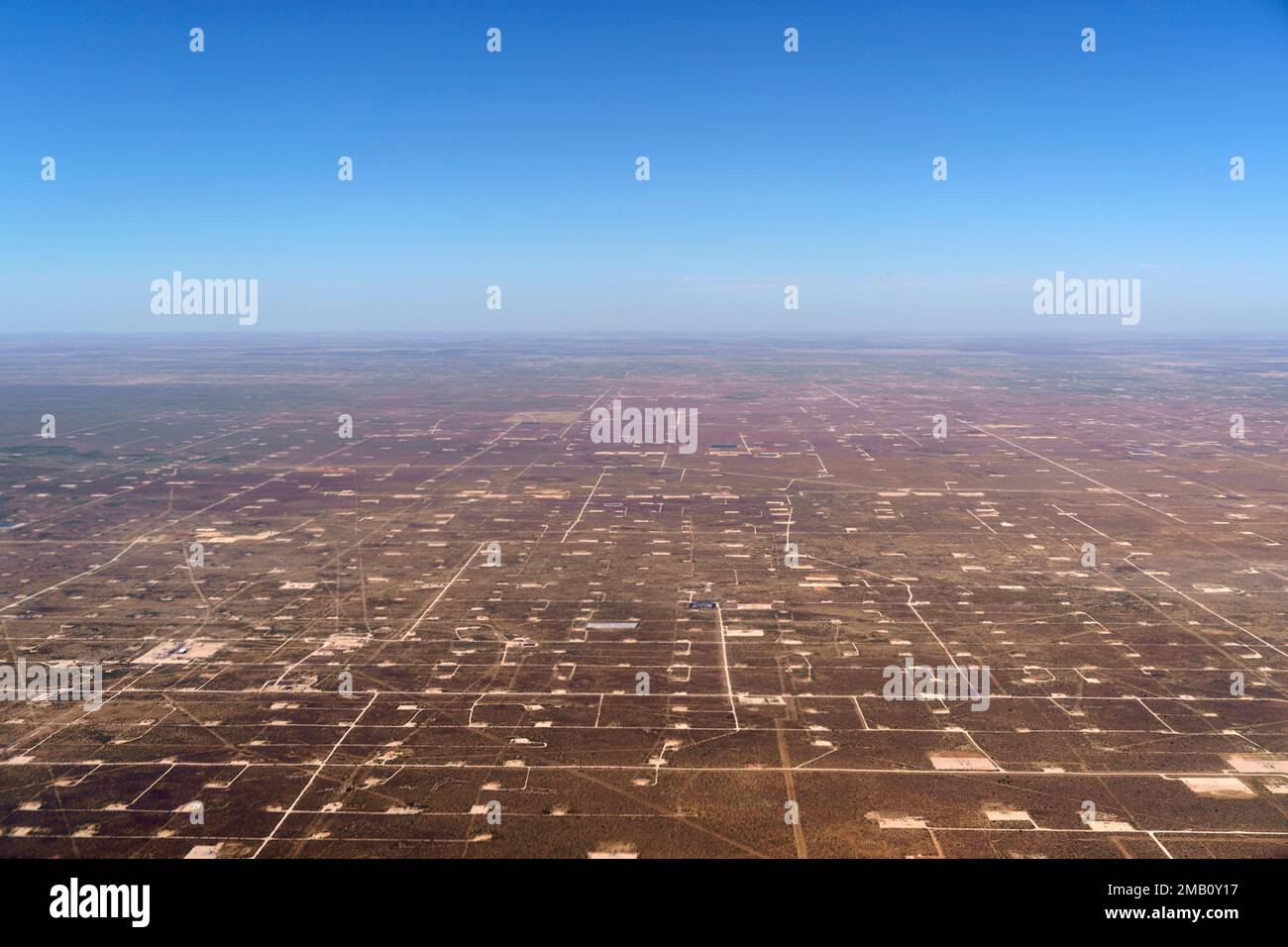 Patches of land housing oil pumpjacks dot the landscape of the Permian ...