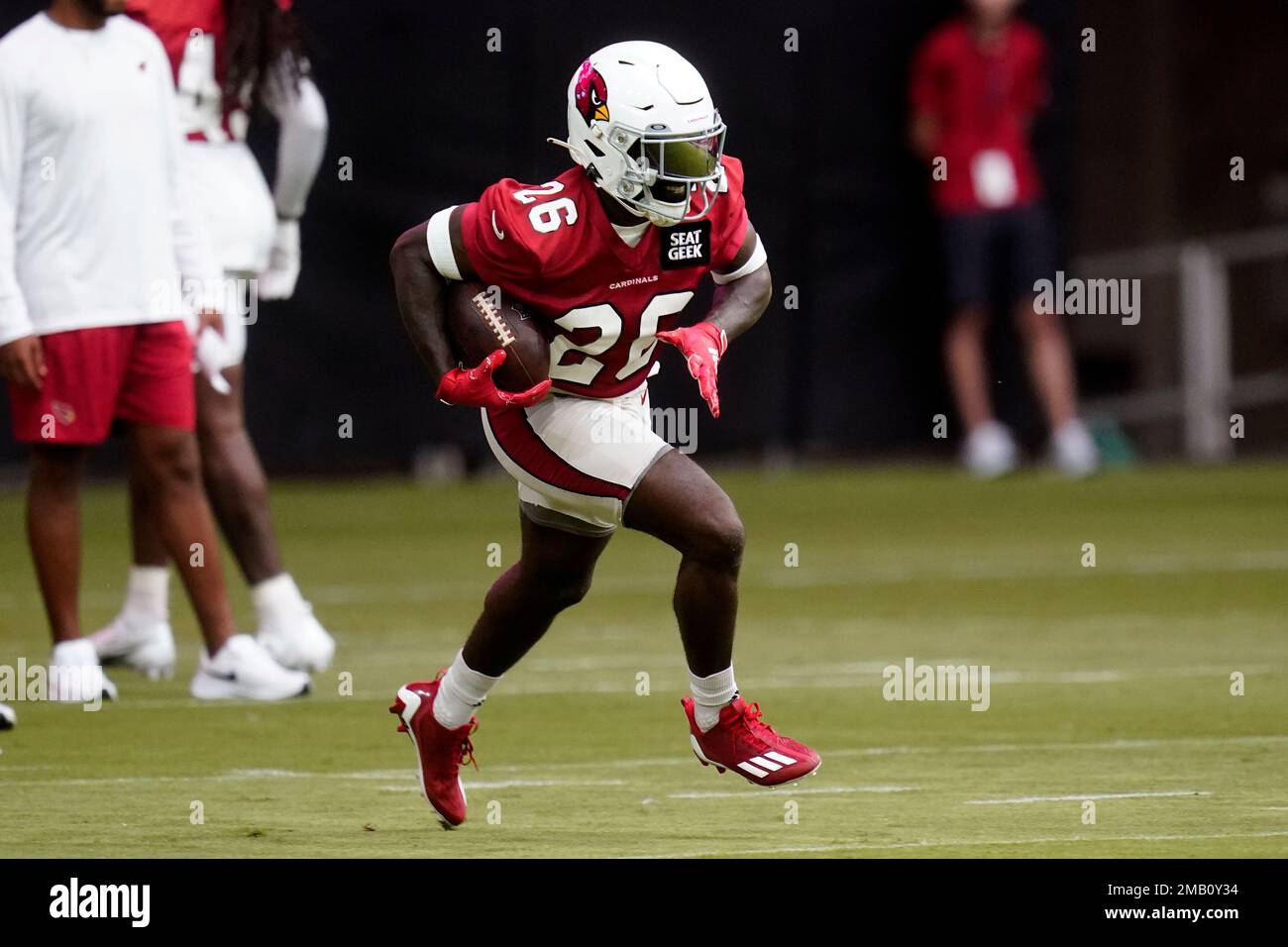 Arizona Cardinals running back Eno Benjamin runs with the ball after ...